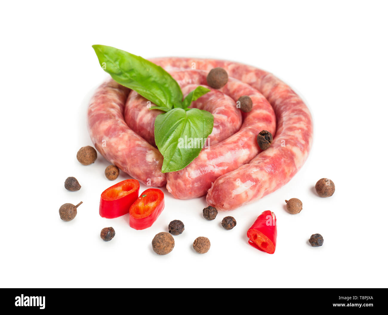 Fresh raw wurst with basil and pepper on white background Stock Photo ...