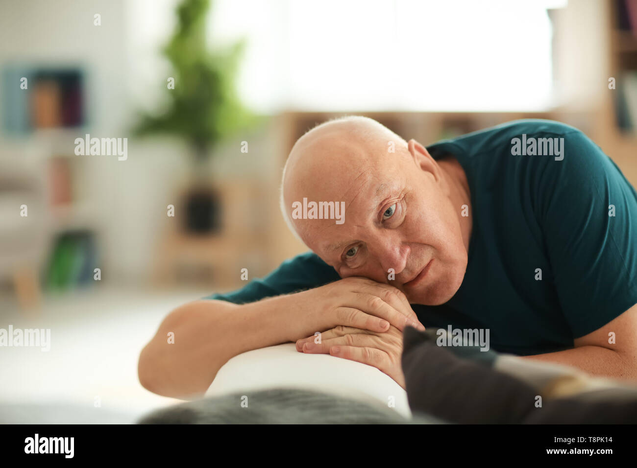 Depressed elderly man at home Stock Photo - Alamy