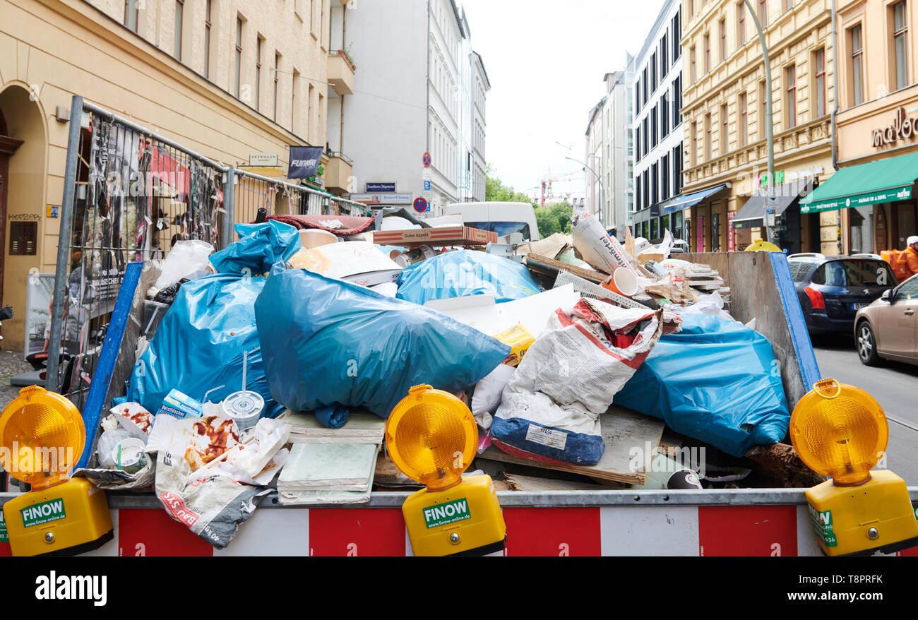 Berlin, Germany. 14th May, 2019. There's a dumpster full of garbage on ...