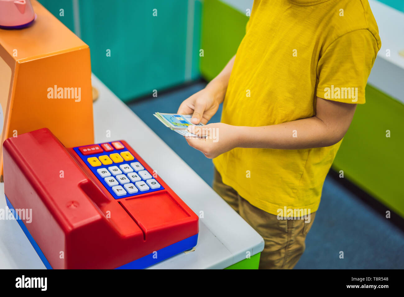 Kid money cashier hi-res stock photography and images - Alamy