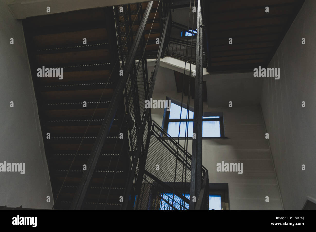 Vertigo stairs, symmetry and windows Stock Photo - Alamy