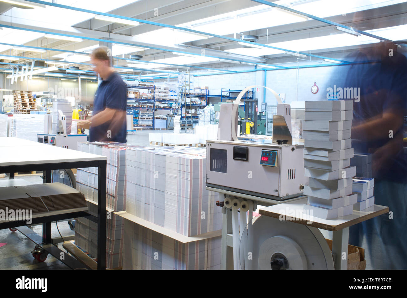 post press finishing line banding system Stock Photo - Alamy