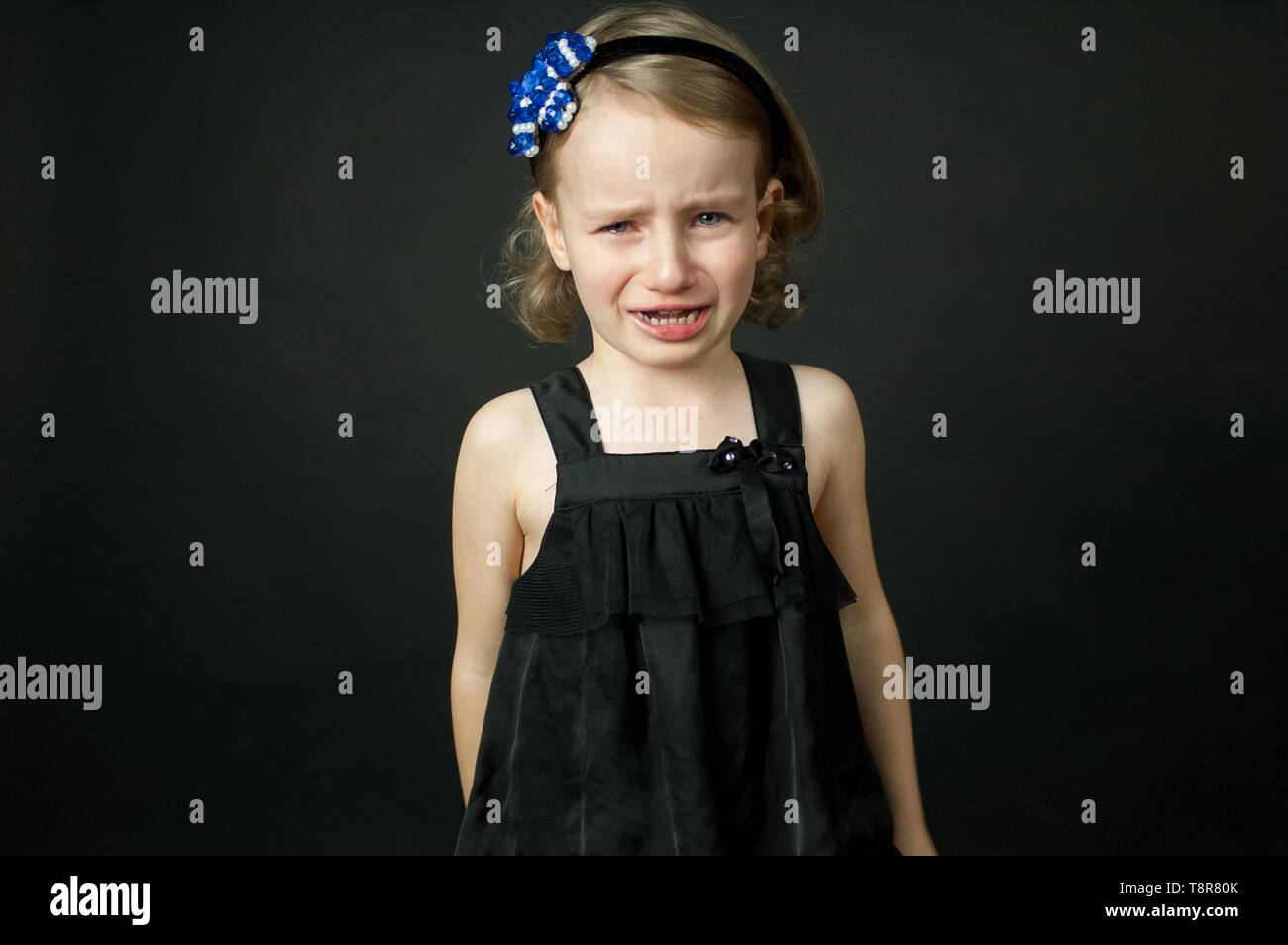 Emotional child with tears - a young girl crying, fine art portrait ...