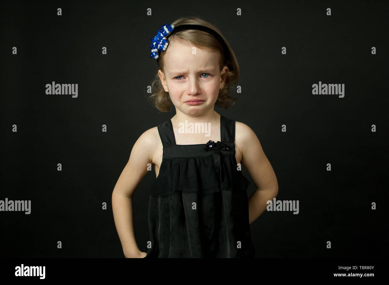Emotional child with tears - a young girl crying, fine art portrait ...