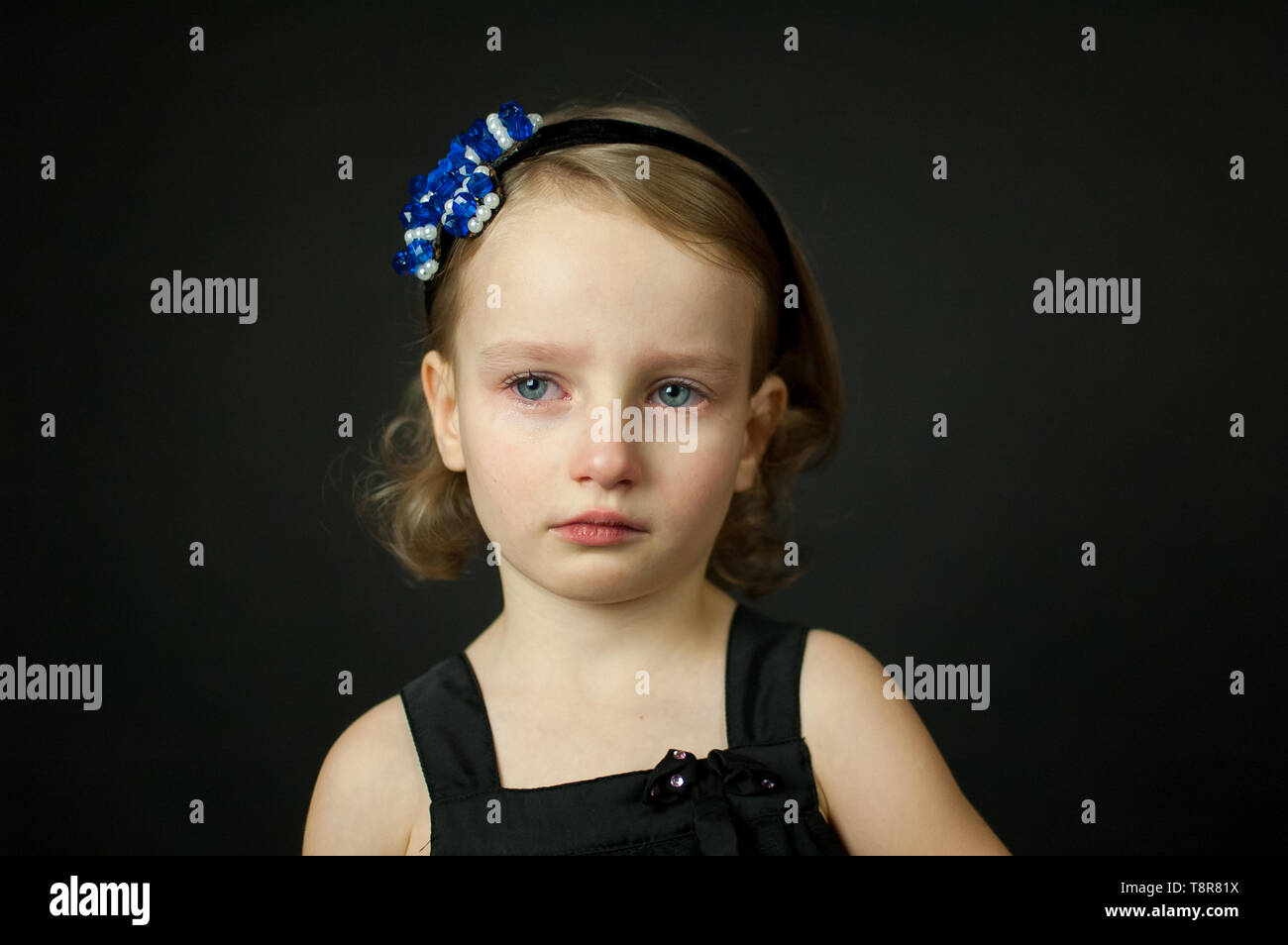 Emotional child with tears - a young girl crying, fine art portrait ...
