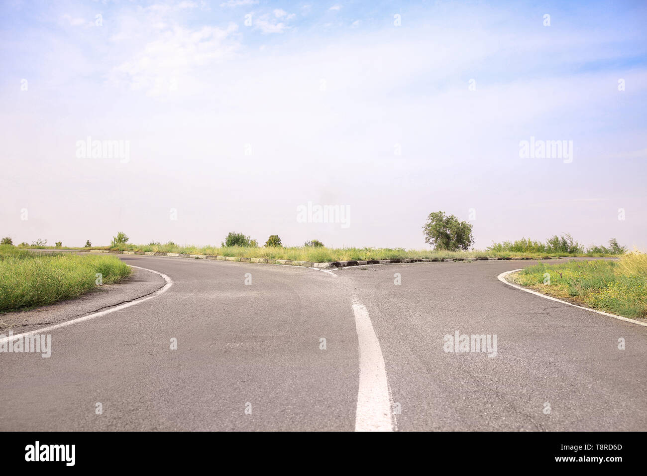 Empty asphalt crossroad in countryside Stock Photo - Alamy