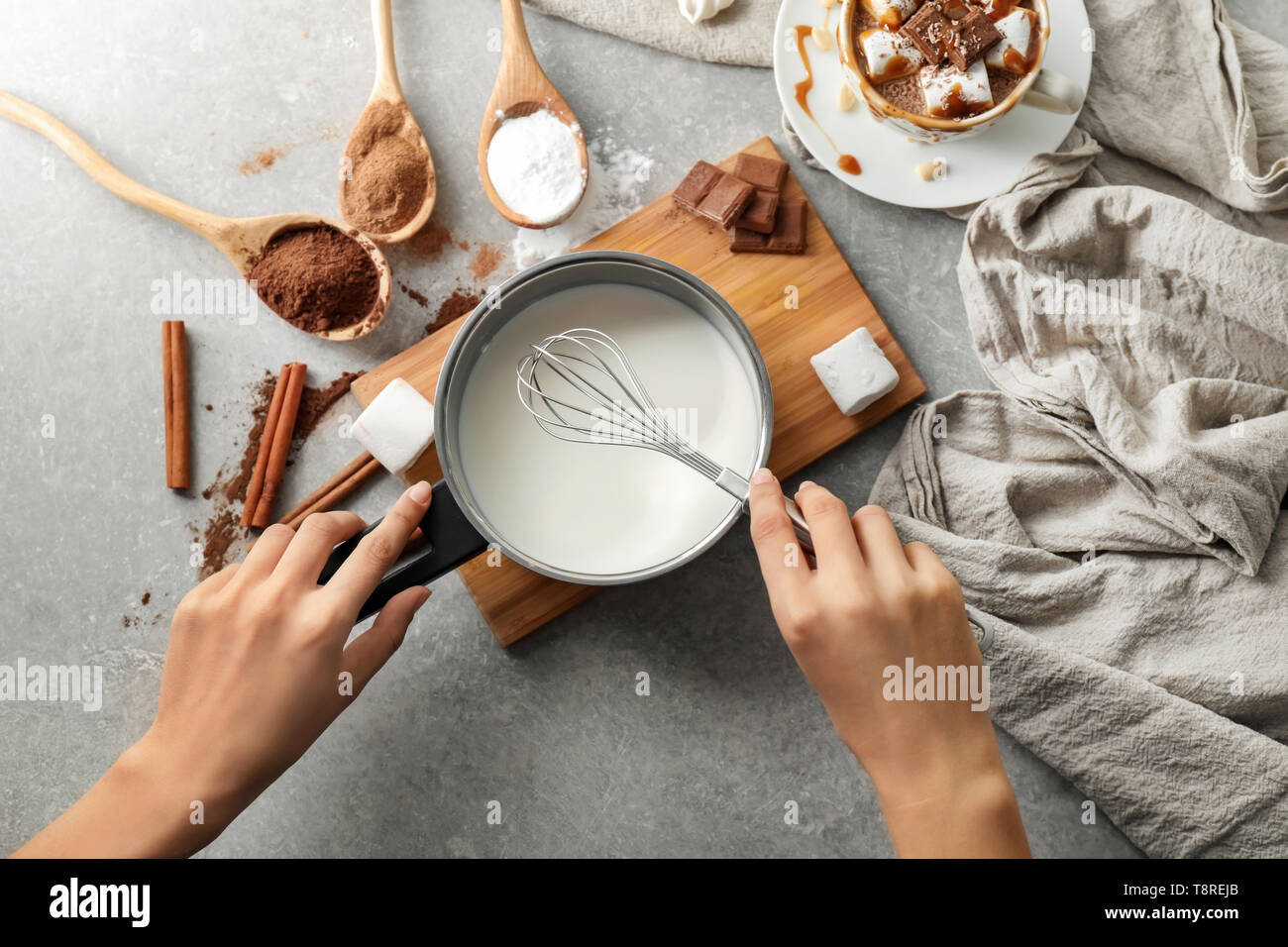 Woman preparing hot chocolate hi-res stock photography and images - Alamy