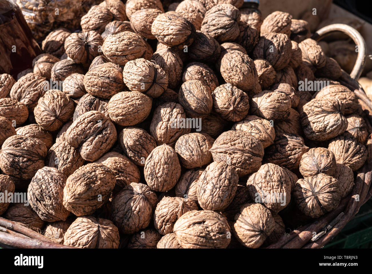 Walnuts on a basket. Food background Stock Photo - Alamy