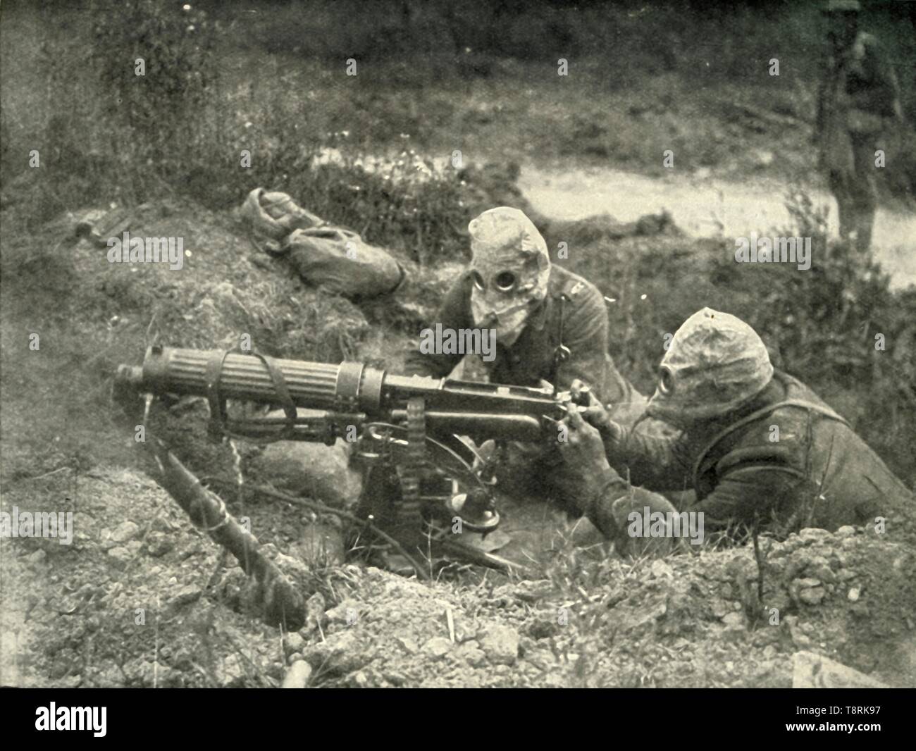 'Machine Gunners in Action Wearing their Gas Helmets', (1919). Creator ...