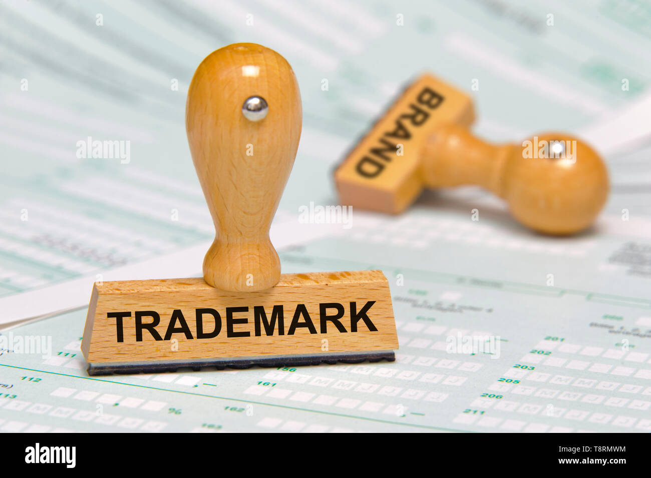 trademark and brand printed on rubber stamp Stock Photo - Alamy