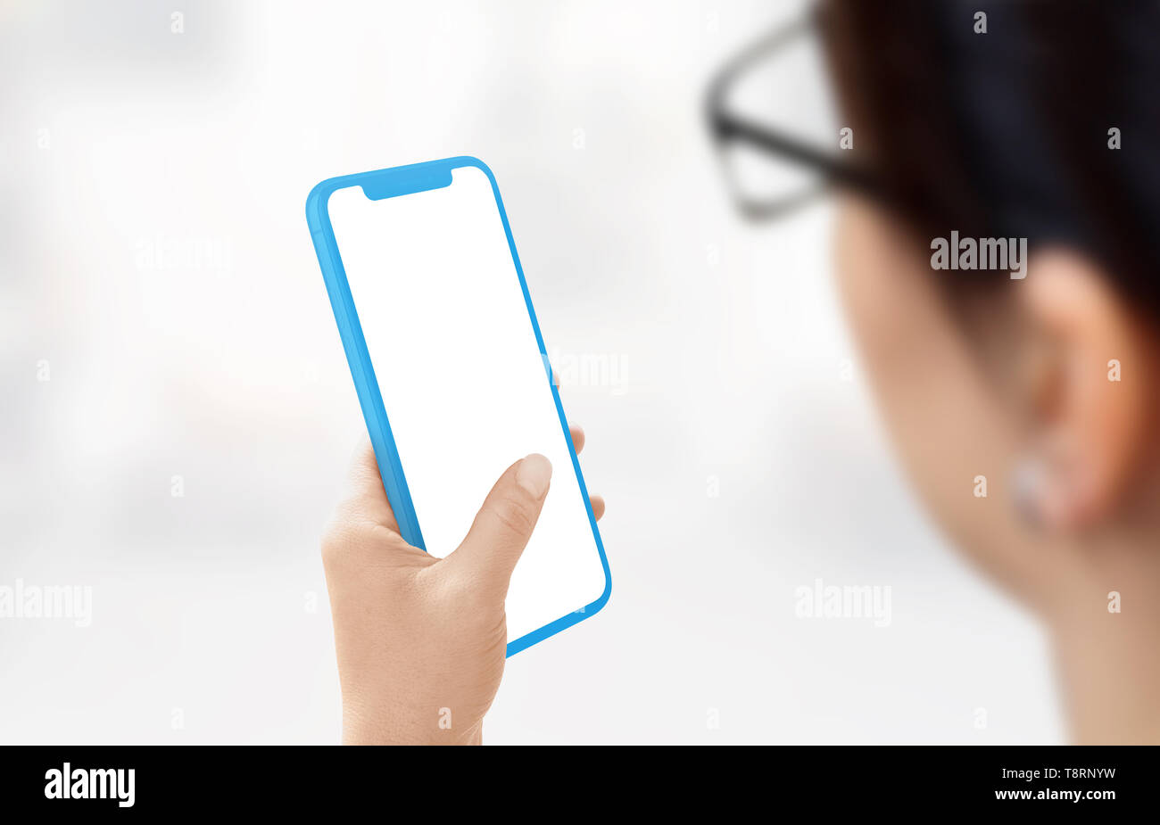 Flat phone concept mockup in woman hand. Smart phone with thin edges ...