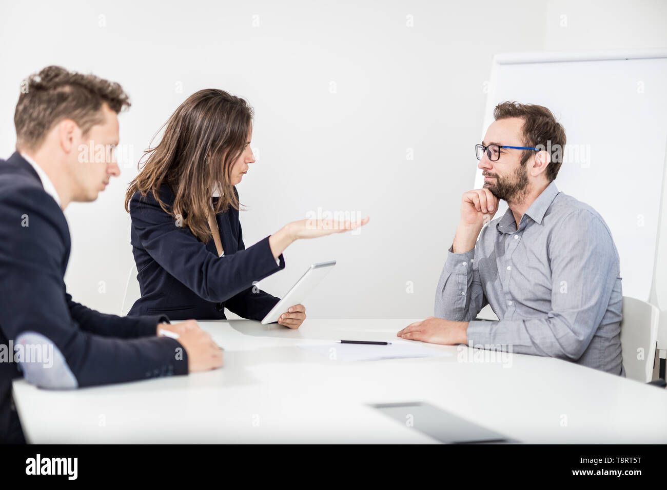 Angry female boss on a business meeting with her colleagues Stock Photo ...