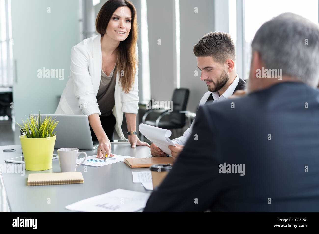 Businesswoman Leads Meeting Around Table. Discussion Talking Sharing ...