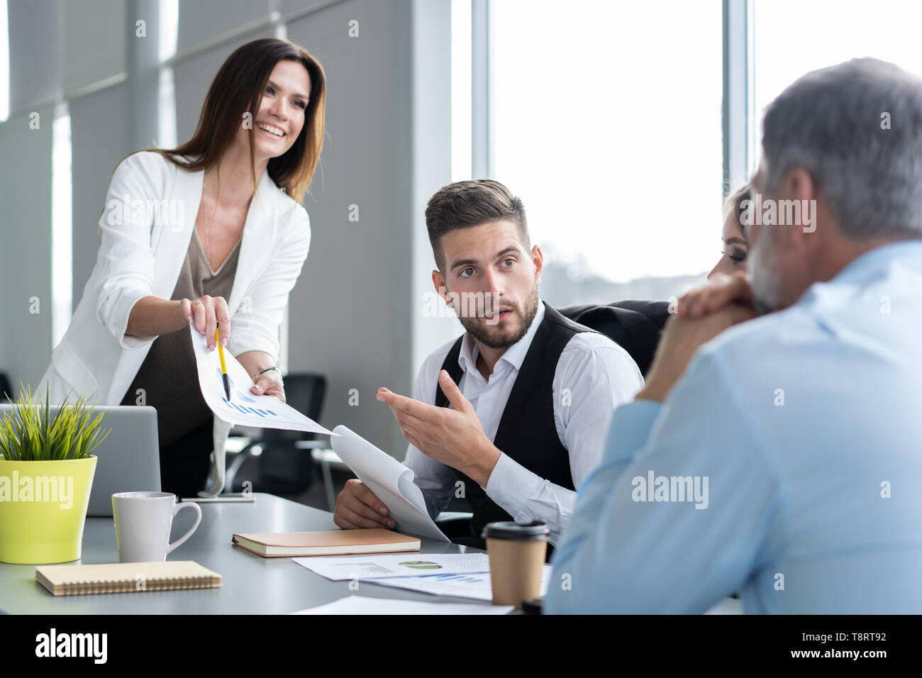 Businesswoman Leads Meeting Around Table. Discussion Talking Sharing ...