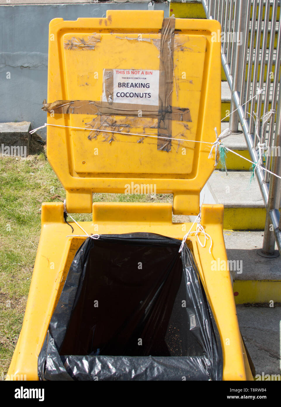 Coconut breaking as an offering to hindu god Stock Photo - Alamy
