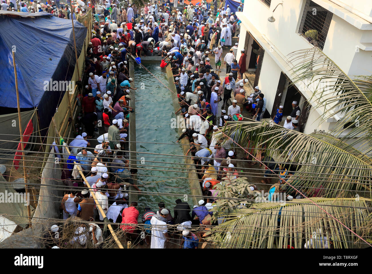 Devotees bathing at a corner of the Biswa Ijtema premises on the bank ...