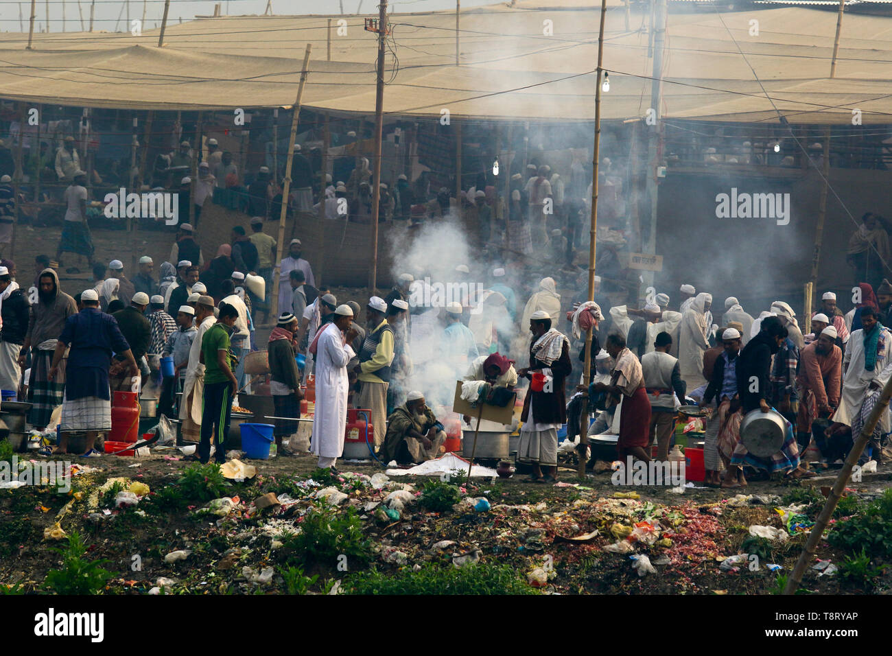 Devotees cooking their food at a corner of the Biswa Ijtema premises on ...