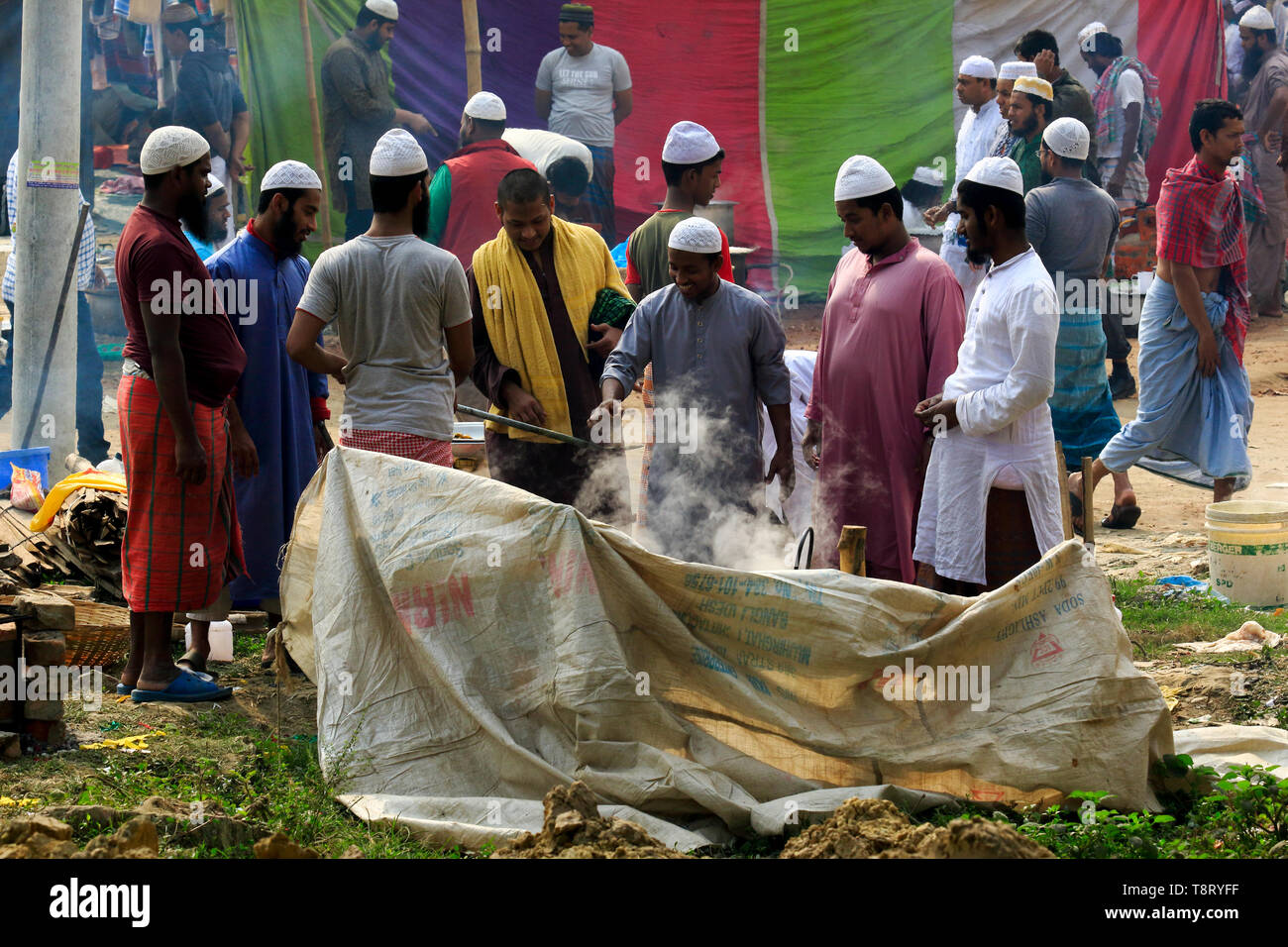 Devotees cooking their food at a corner of the Biswa Ijtema premises on ...