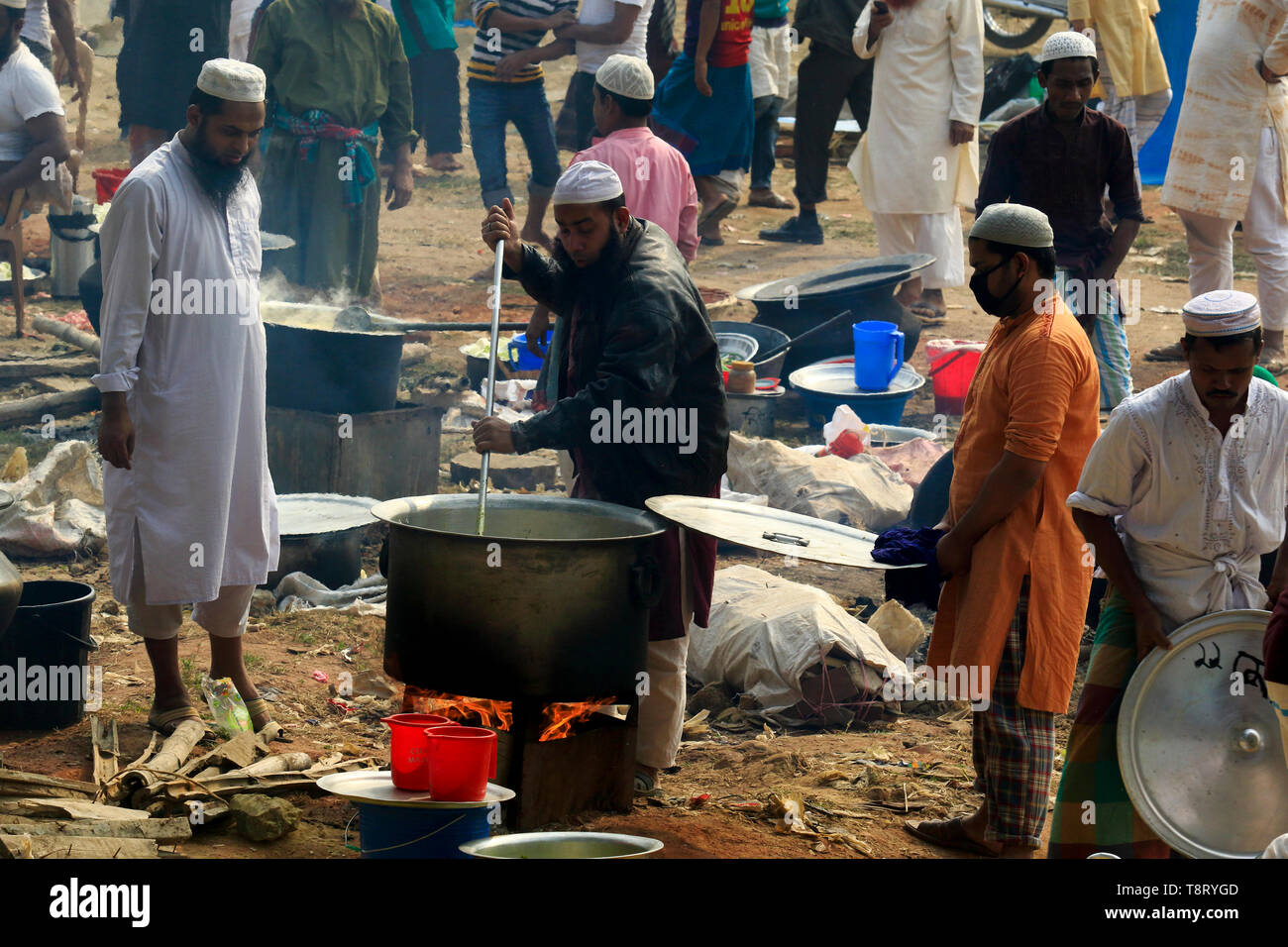 Devotees cooking their food at a corner of the Biswa Ijtema premises on ...