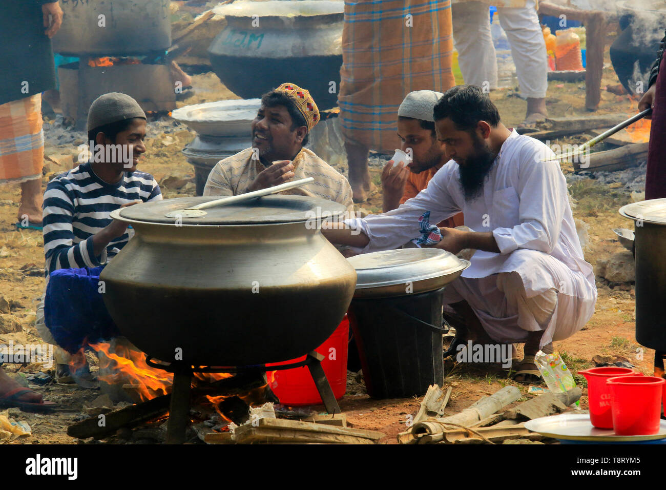 Devotees cooking their food at a corner of the Biswa Ijtema premises on ...