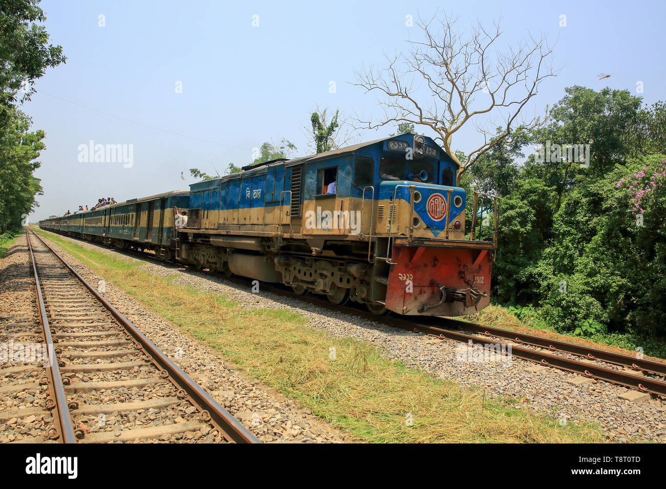 A Chittagong bound passenger train on the Dhaka-Chittagong double track ...