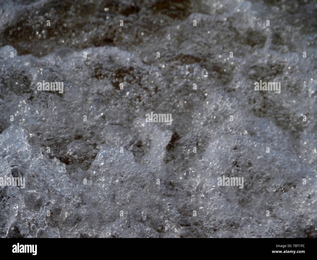 Bubbly water at beach, Australia Stock Photo - Alamy