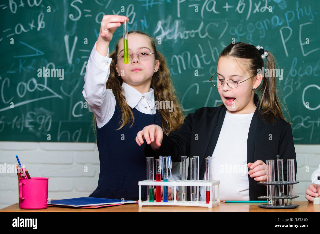 Little children. Science. Chemistry science. biology experiments with ...