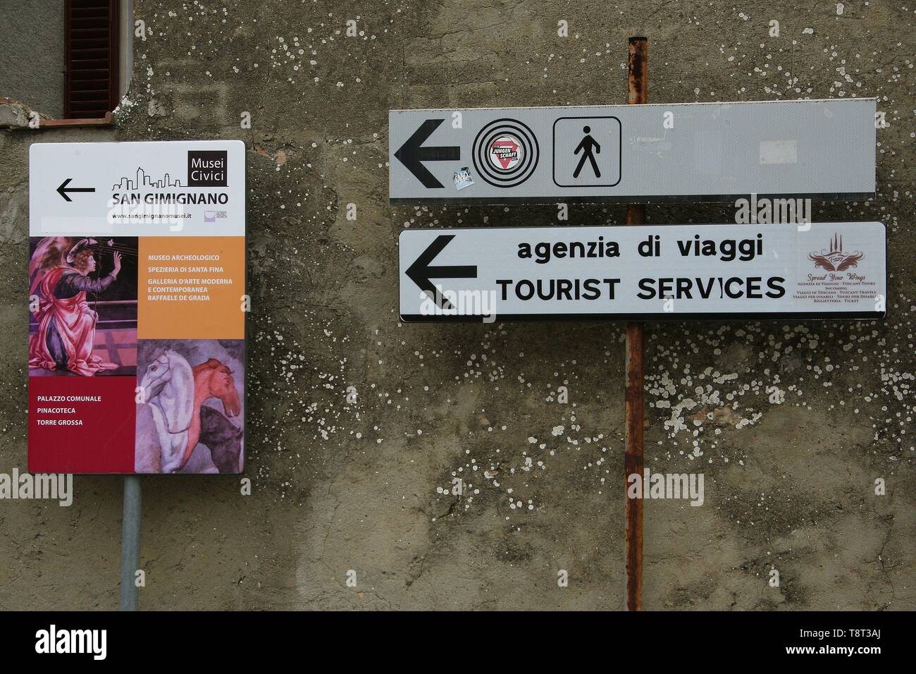 Tourist travel information signs in the hilltop town of San Gimignano ...