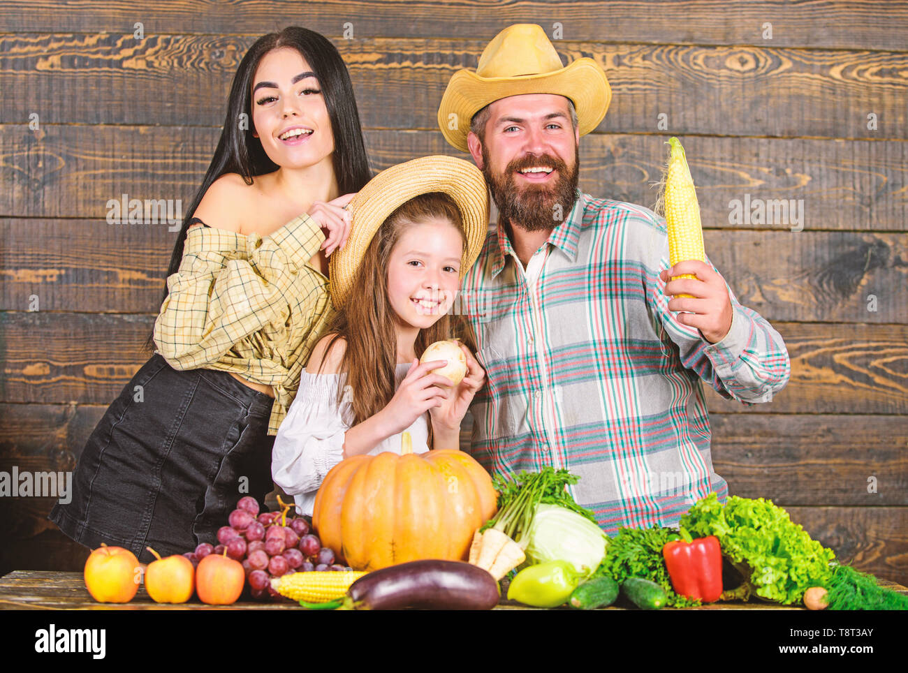 Family farm festival concept. Man bearded rustic farmer with kid and ...