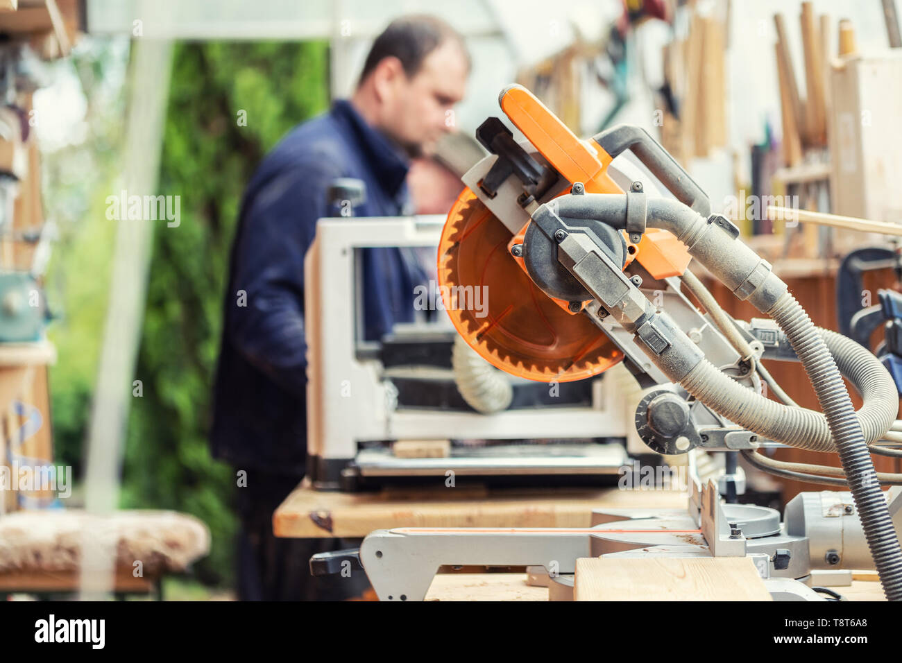 Craftsman woodworking at carpentry with lots of modern professional ...