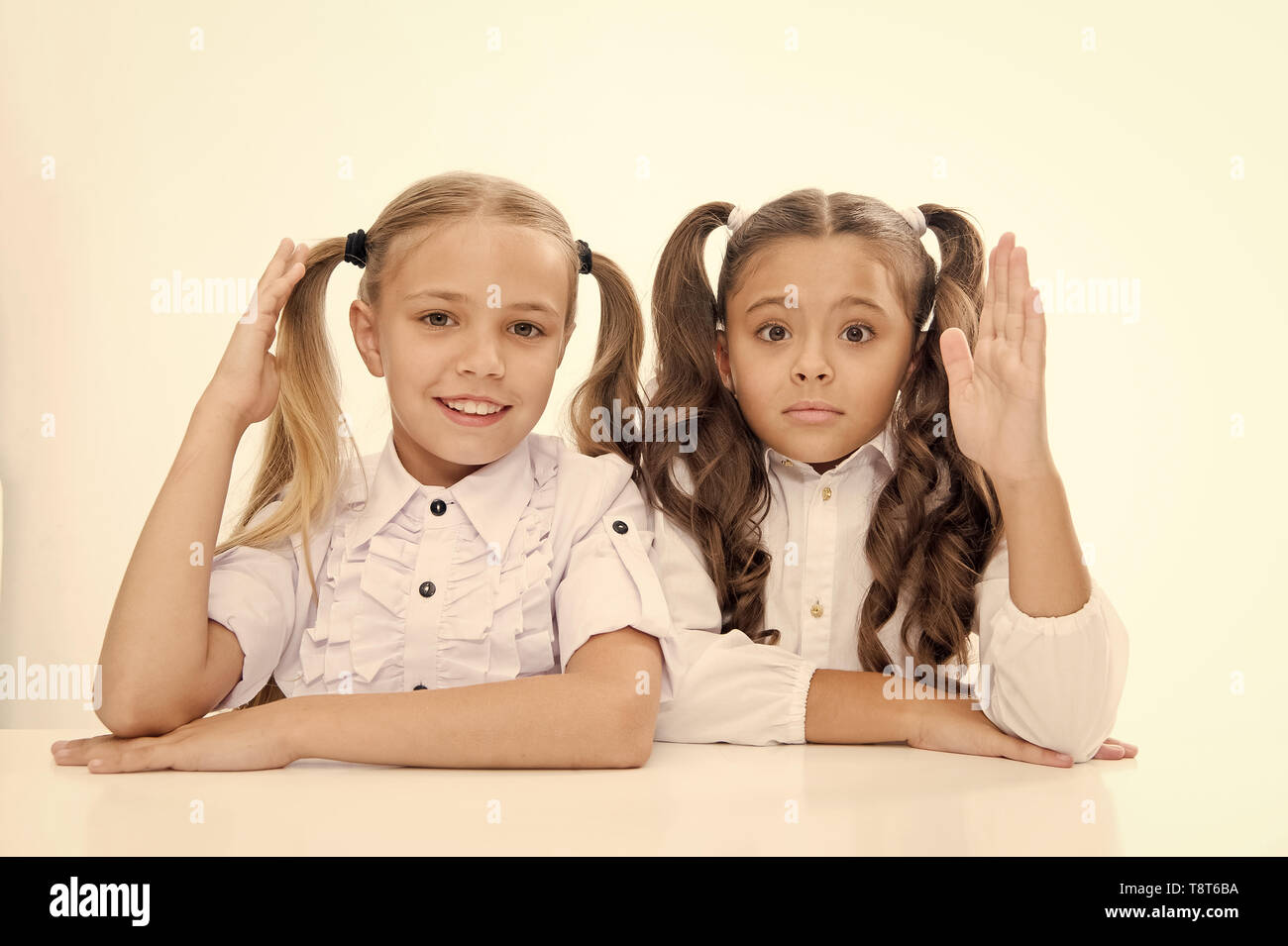 question and answer. little school girls know answer to question. i ...