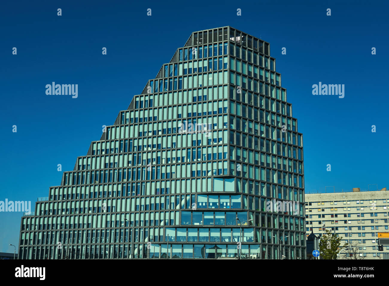 Facade of a modern skyscraper in Poznan, Poland Stock Photo - Alamy