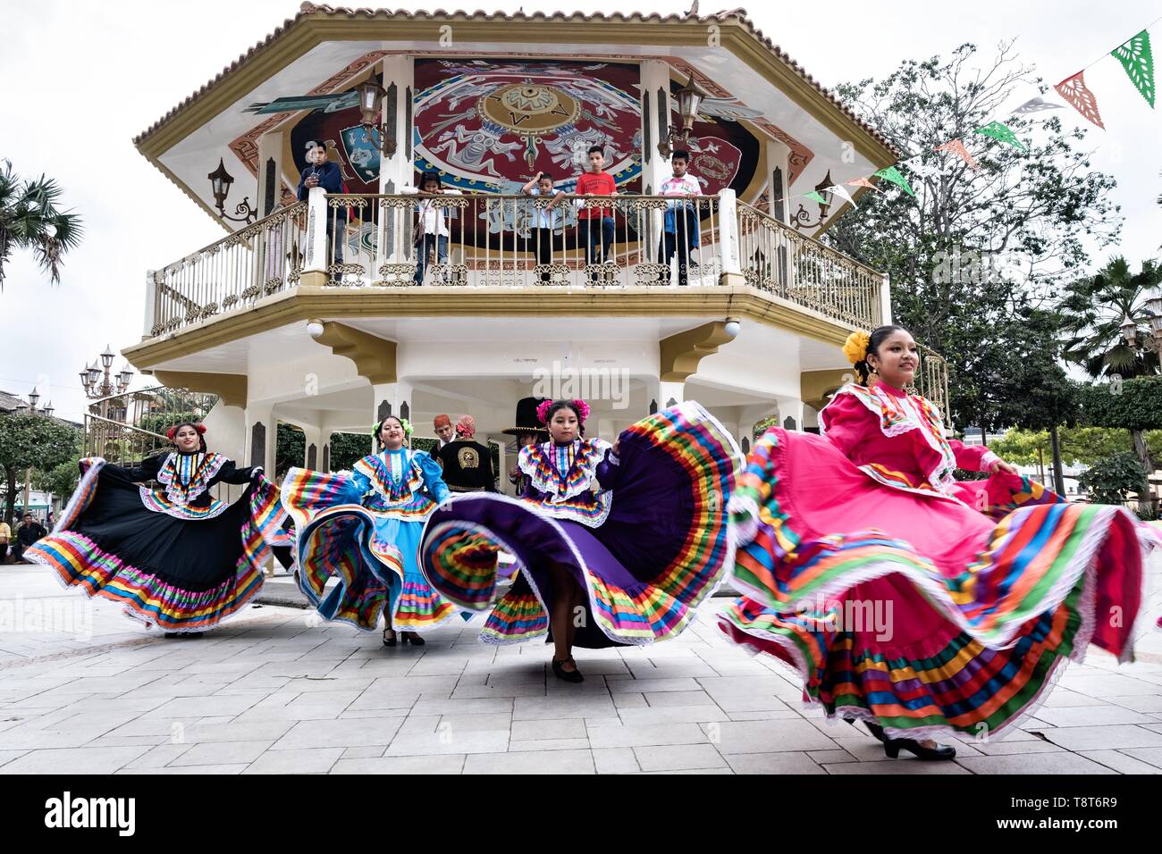 Costumed Mexican dancers perform the traditional Jarabe Tapatío folk ...