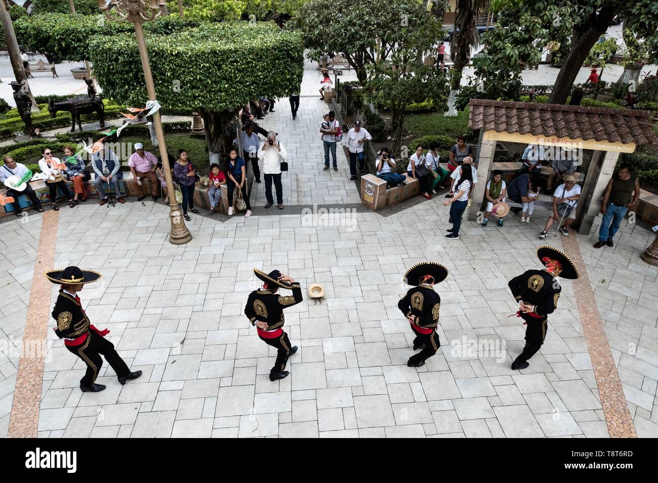 Costumed Mexican dancers perform the traditional Jarabe Tapatío folk ...