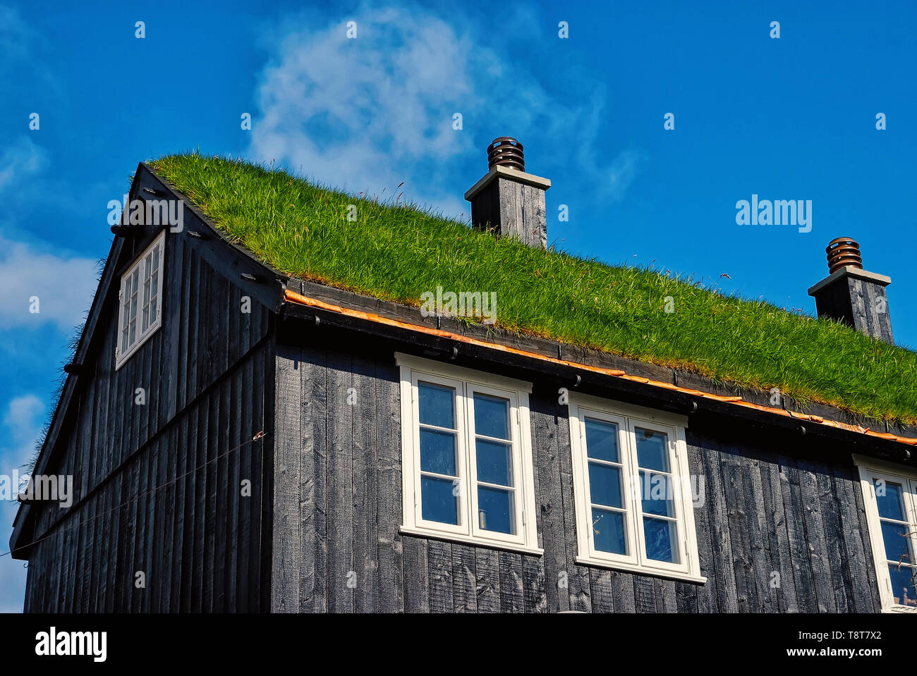 House with grass roof in Torshavn, Denmark. Eco friendly building ...