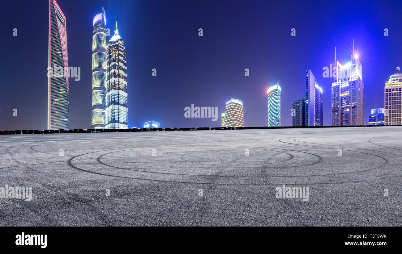Asphalt race track and modern skyline and buildings in Shanghai at ...