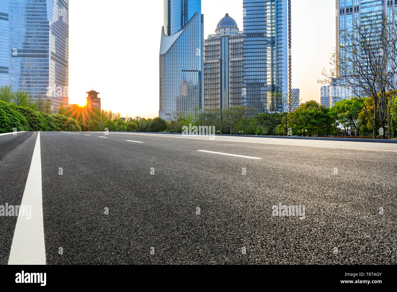 Shanghai modern commercial office buildings and empty asphalt highway ...