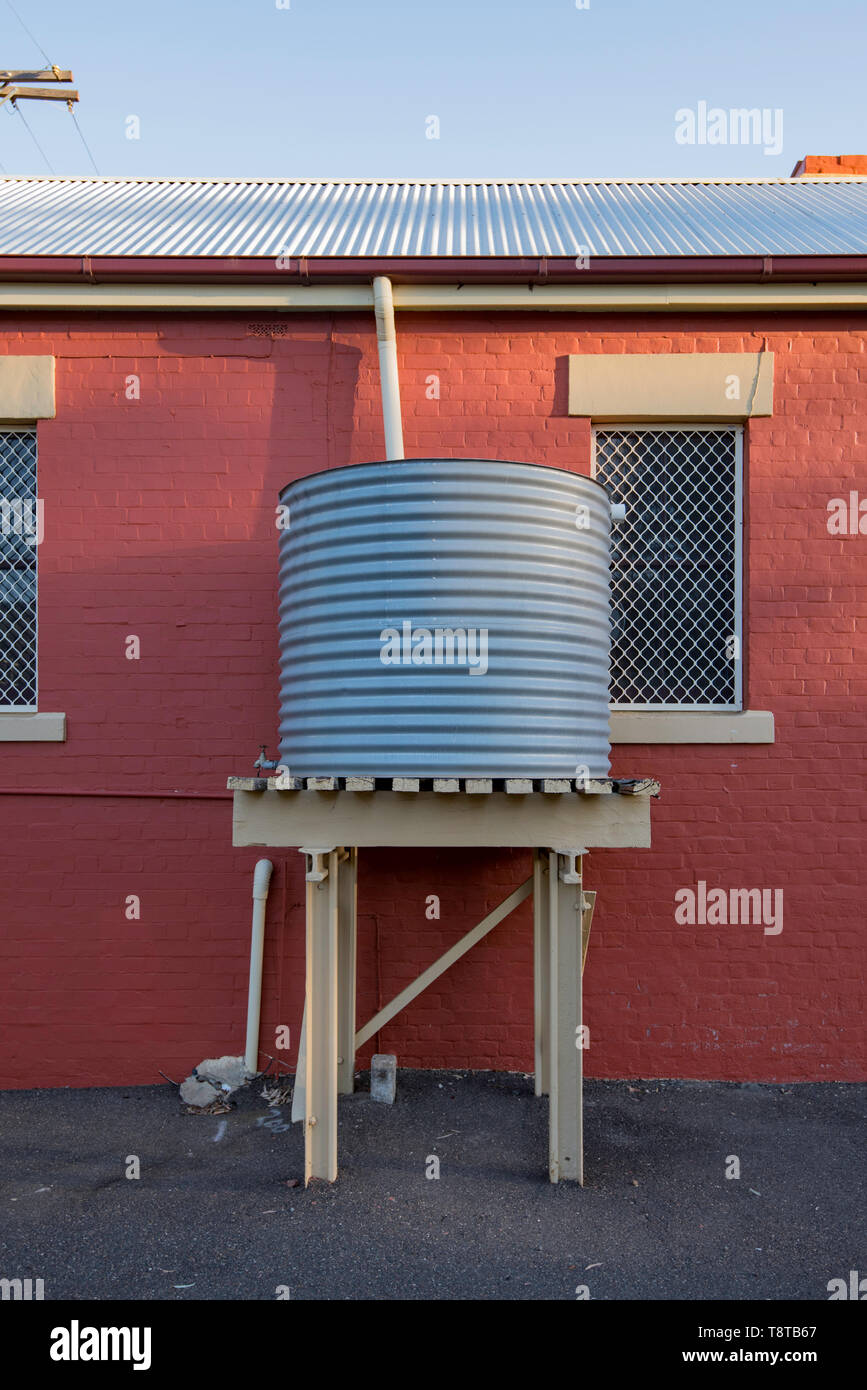 A galvanized iron rainwater collection tank at Murrurundi Railway ...