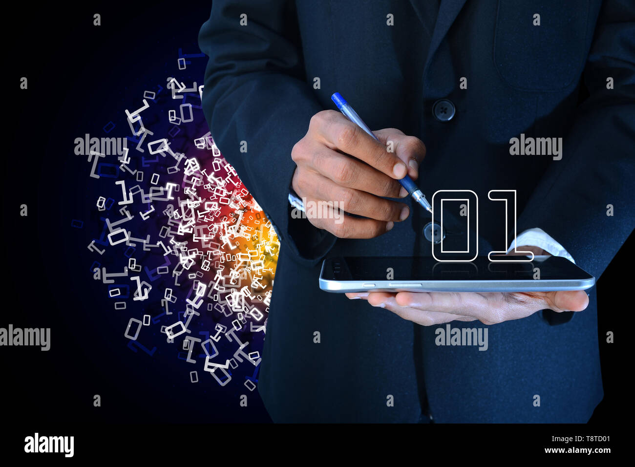 Man showing the binary digits with tablet computer Stock Photo - Alamy