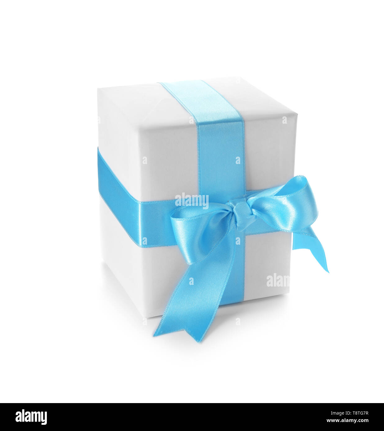 Gift box with blue ribbon on white background Stock Photo - Alamy