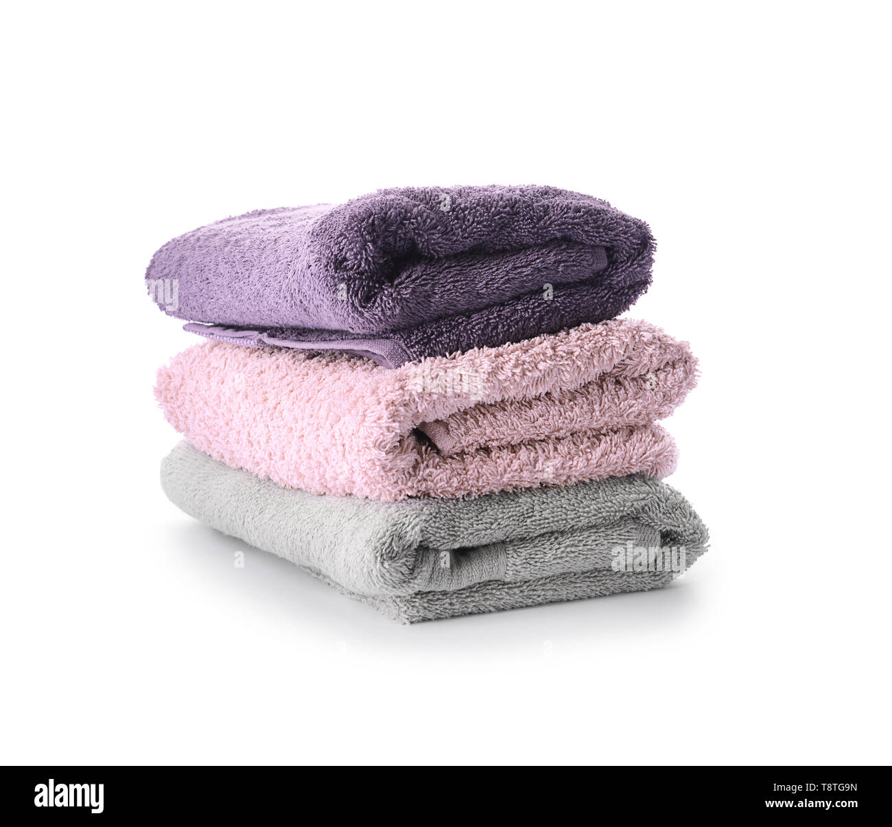 Stack of clean towels on white background Stock Photo - Alamy