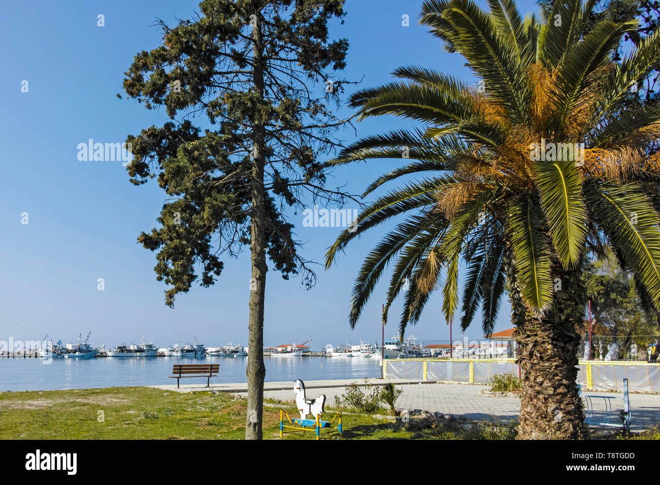 NEA MOUDANIA, GREECE - MARCH 31, 2019: View from Coastal street of town ...