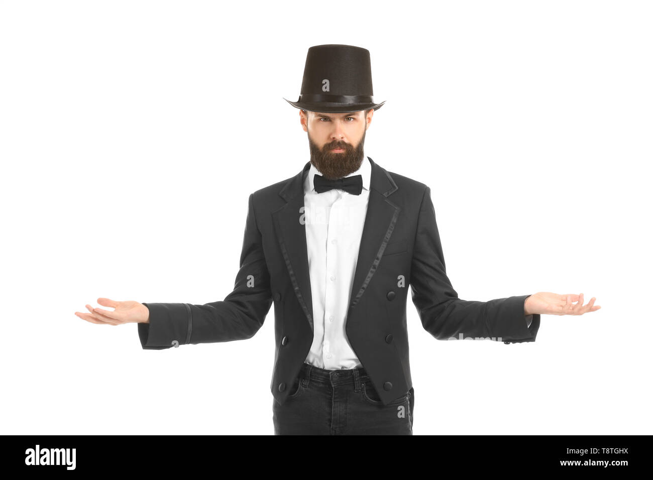 Male magician on white background Stock Photo - Alamy