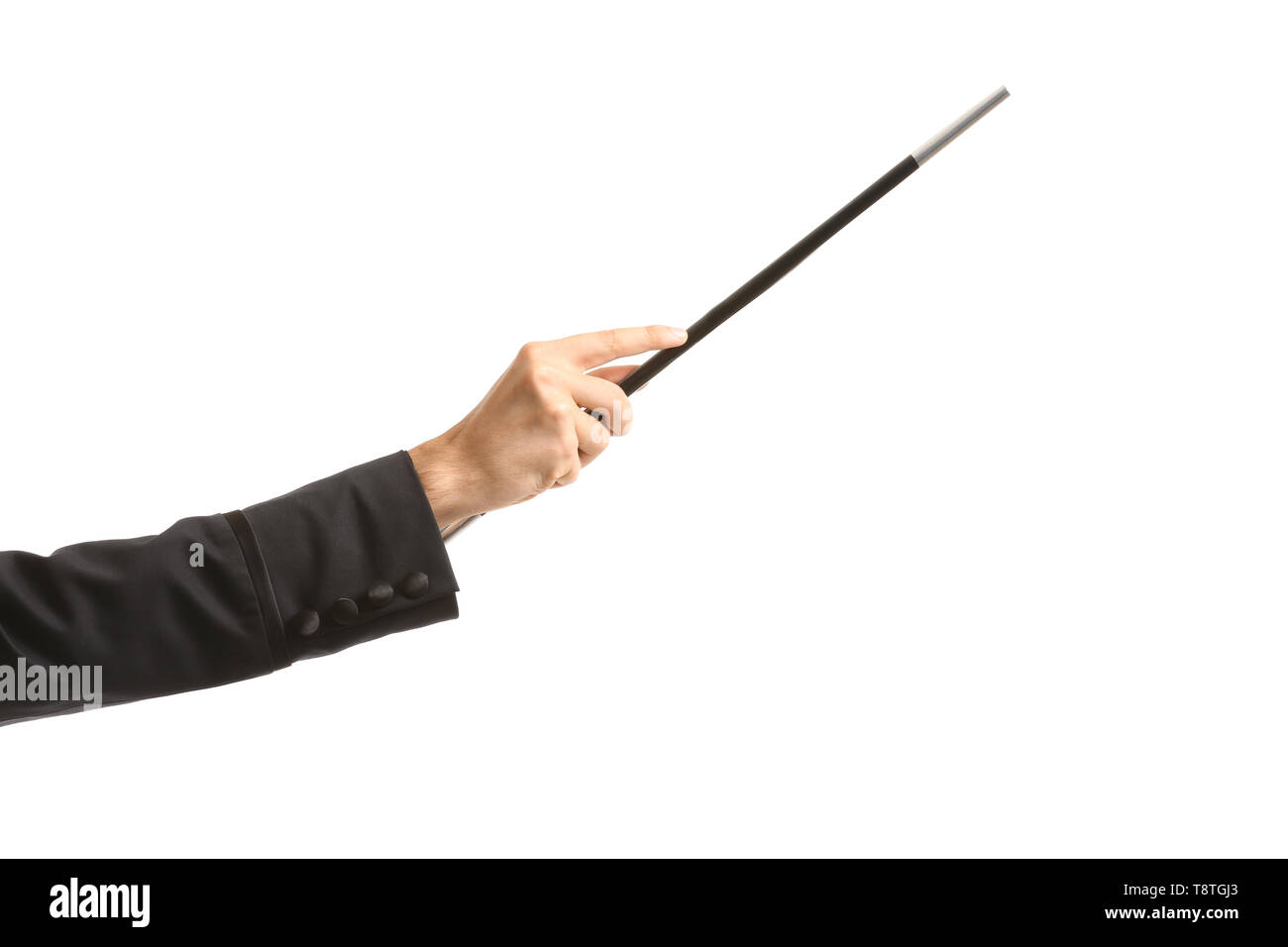Hand of illusionist with magic wand on white background Stock Photo - Alamy
