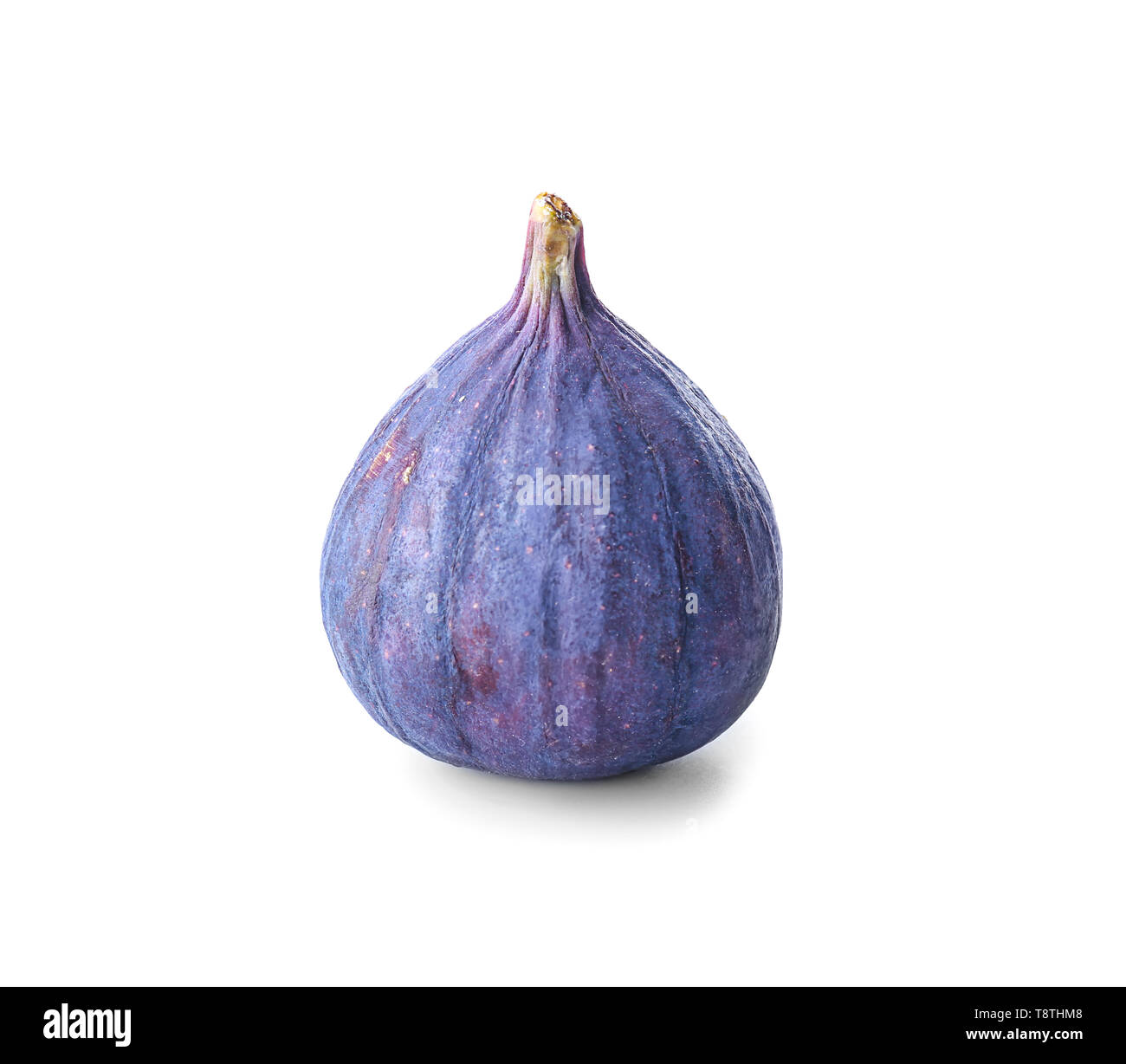 Whole ripe purple fig on white background Stock Photo - Alamy