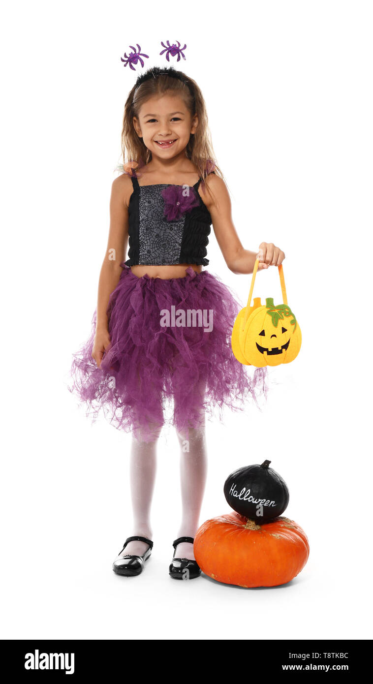 Cute little girl dressed for Halloween on white background Stock Photo ...