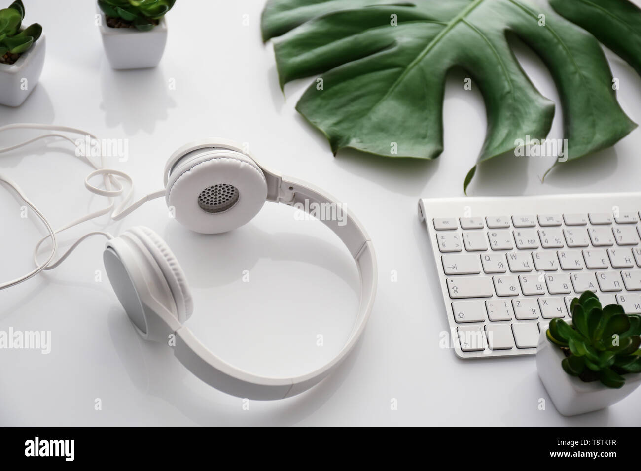 Headphones computer keyboard tropical hi-res stock photography and ...
