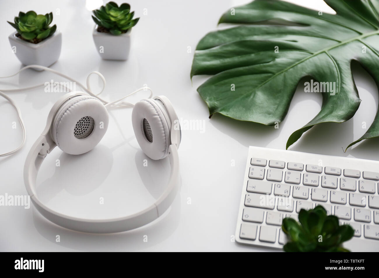 Headphones computer keyboard tropical hi-res stock photography and ...