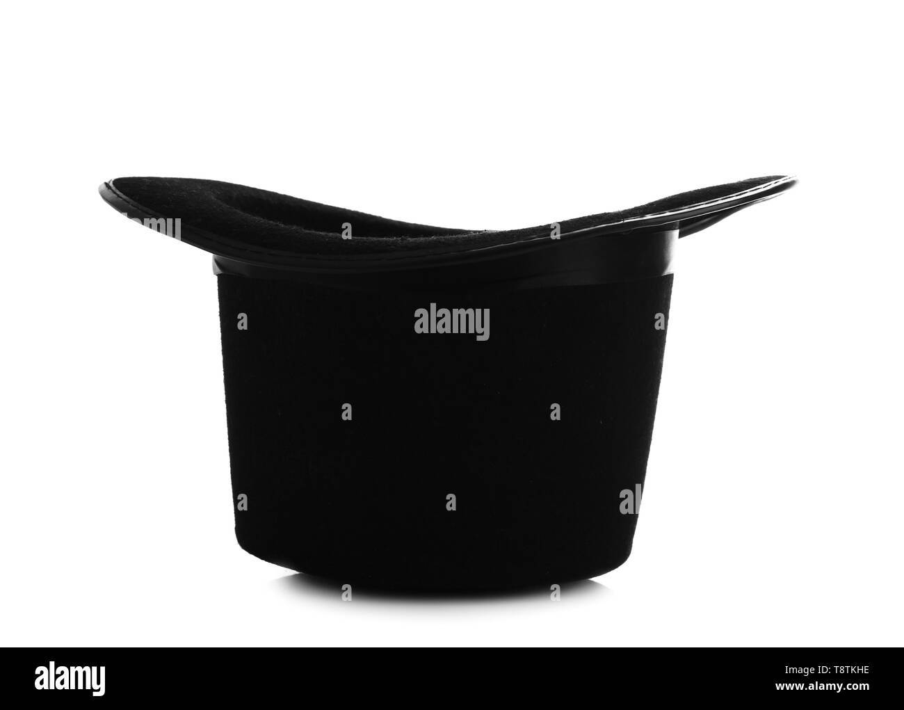 Black magician hat on white background Stock Photo - Alamy