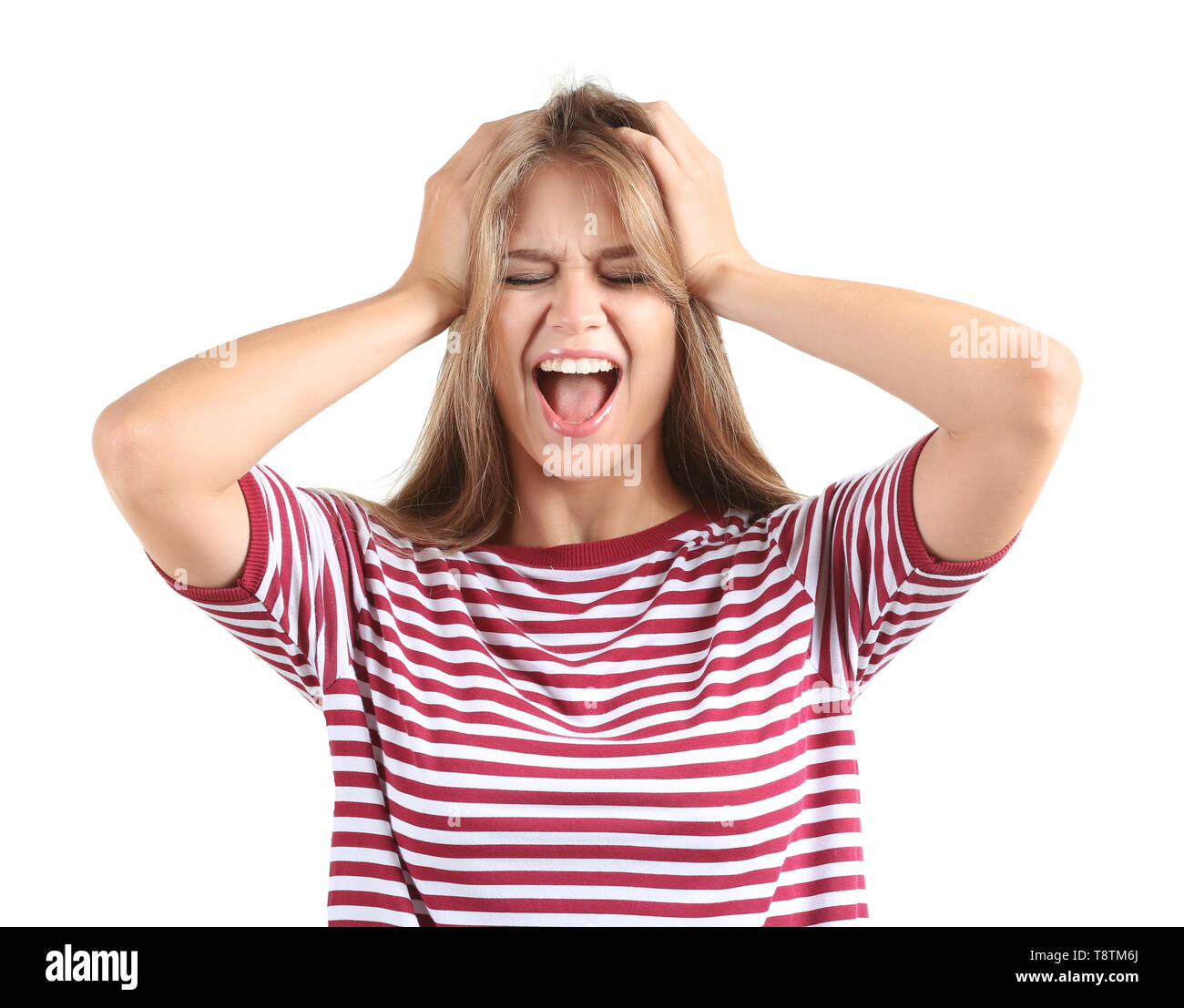 Stressed young woman on white background Stock Photo - Alamy